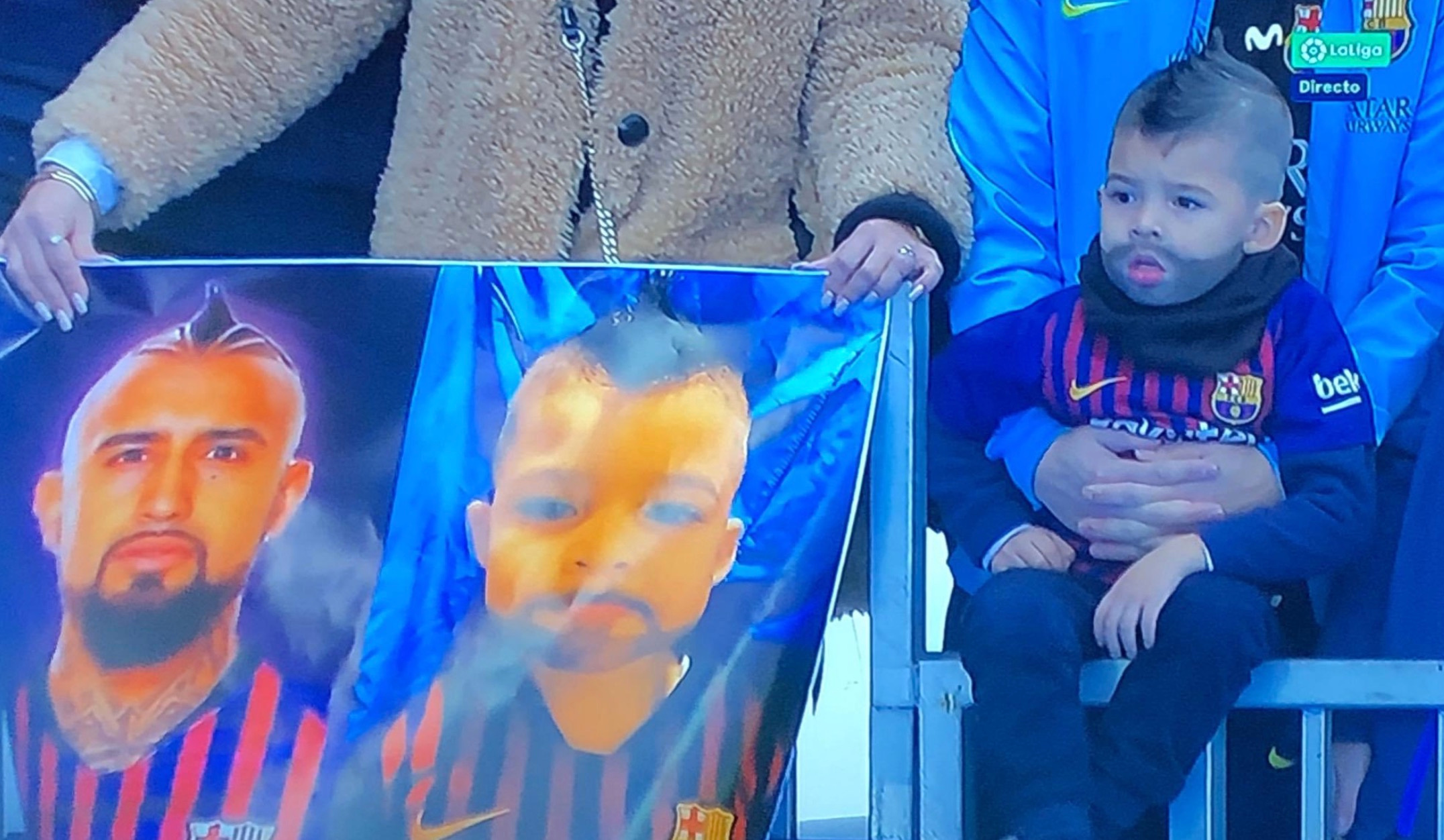 Little Barcelona fan with Arturo Vidal mohawk and goatee steals ...